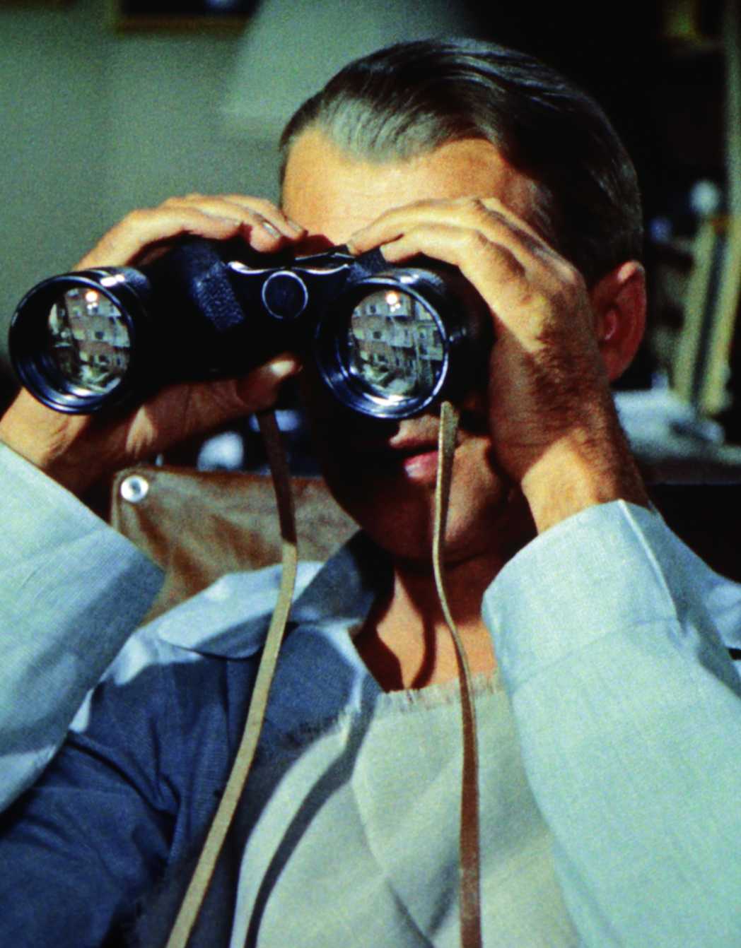 Jimmy Stewart with binoculars in Rear Window (1954) – The Reel Bits